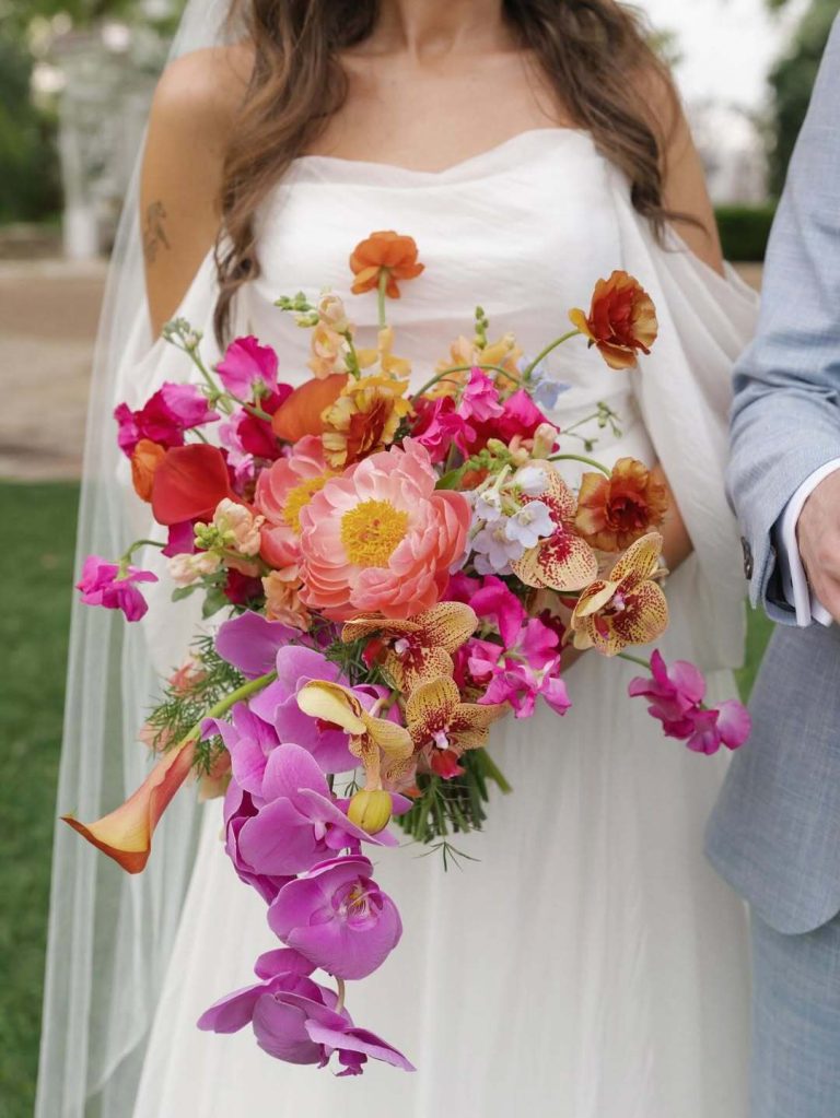 A Dreamsicle Palette Adorns this Boho Winter Wedding